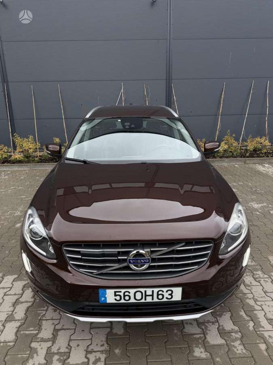 Brown Volvo XC60 2014 in Vilnius, with an engine capacity of 2.40 L and mileage of 287 thousand km for 11500 €, photo 4 on AUTOMOTO.COM.LV