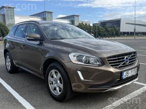 Brūns Volvo XC60 2014 Rīga, ar dzinēja tilpumu 2.00 L un nobraukumu 141 tūkst. km par 12500 €, foto  vietnē AUTOMOTO.COM.LV