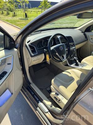 Brown Volvo XC60 2014 in Riga, with an engine capacity of 2.00 L and mileage of 247 thousand km for 12400 €, photo 9 on AUTOMOTO.COM.LV