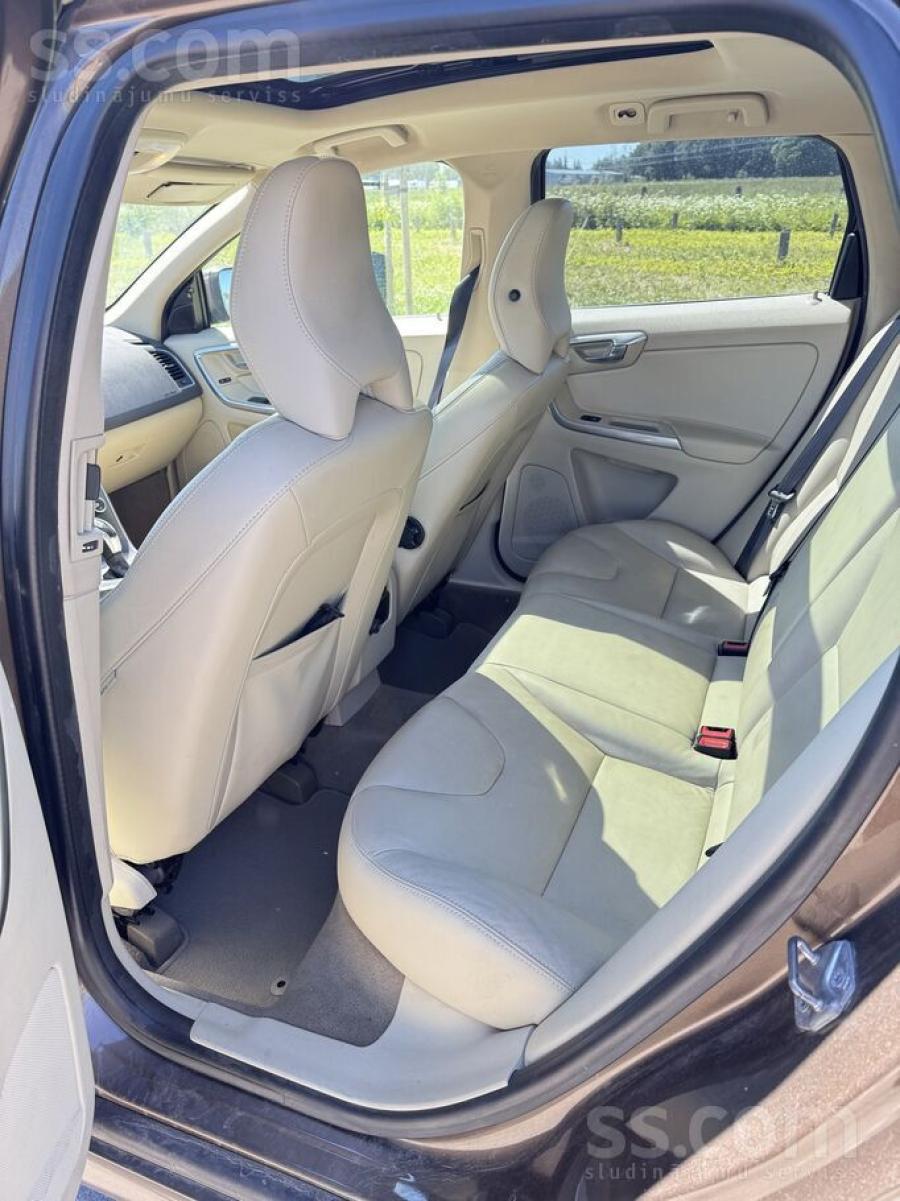Brown Volvo XC60 2014 in Riga, with an engine capacity of 2.00 L and mileage of 247 thousand km for 12400 €, photo 11 on AUTOMOTO.COM.LV