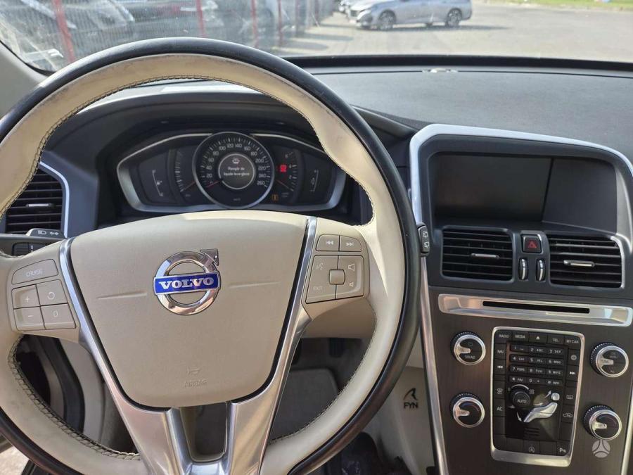 Brown Volvo XC60 2014 in Taurage, with an engine capacity of 2.00 L and mileage of 280 thousand km for 5950 €, photo 13 on AUTOMOTO.COM.LV