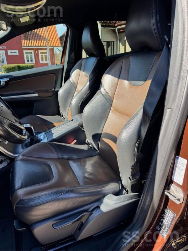 Brown Volvo XC60 2015 in Talsi, with an engine capacity of 2.00 L and mileage of 246 thousand km for 11900 €, photo 8 on AUTOMOTO.COM.LV