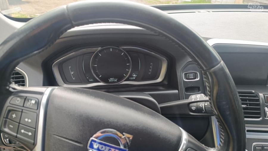 Brown Volvo XC60 2015 in Alytus, with an engine capacity of 2.00 L and mileage of 303 thousand km for 10499 €, photo 15 on AUTOMOTO.COM.LV