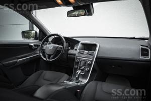 Brown Volvo XC60 2015 in Riga, with an engine capacity of 2.40 L and mileage of 288 thousand km for 11950 €, photo 17 on AUTOMOTO.COM.LV