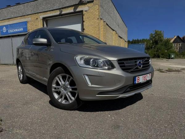 Brown Volvo XC60 2015 in Tukums, with an engine capacity of 2.40 L and mileage of 209 thousand km for 13900 €, photo 3 on AUTOMOTO.COM.LV