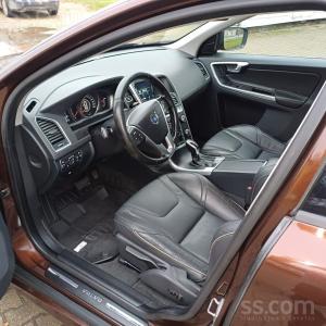 Brown Volvo XC60 2015 in Riga, with an engine capacity of 2.00 L and mileage of 371 thousand km for 9990 €, photo 5 on AUTOMOTO.COM.LV