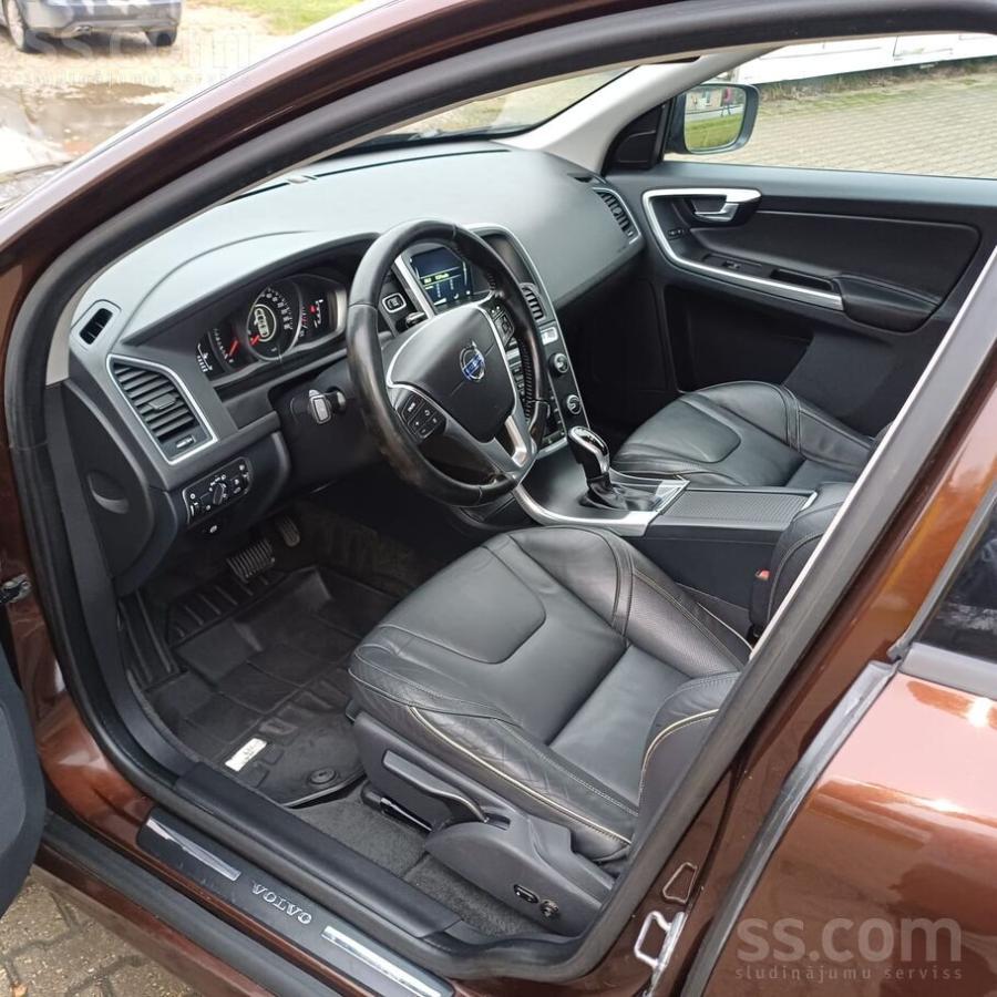 Brown Volvo XC60 2015 in Riga, with an engine capacity of 2.00 L and mileage of 371 thousand km for 9990 €, photo 5 on AUTOMOTO.COM.LV