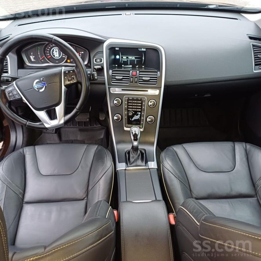 Brown Volvo XC60 2015 in Riga, with an engine capacity of 2.00 L and mileage of 371 thousand km for 9990 €, photo 6 on AUTOMOTO.COM.LV