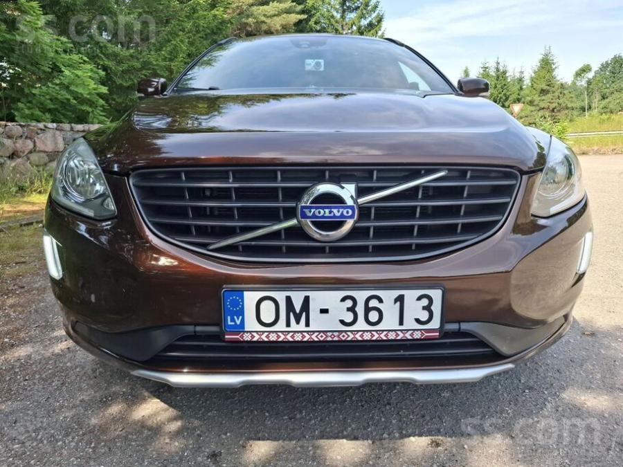Brown Volvo XC60 2015 in Talsi, with an engine capacity of 2.00 L and mileage of 258 thousand km for 9000 €, photo 12 on AUTOMOTO.COM.LV