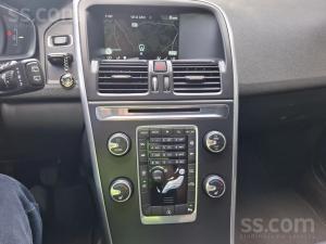 Brown Volvo XC60 2015 in Talsi, with an engine capacity of 2.00 L and mileage of 258 thousand km for 9000 €, photo 13 on AUTOMOTO.COM.LV
