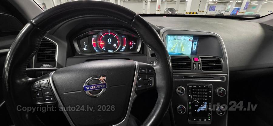 Brown Volvo XC60 2015 in Tallinn, with an engine capacity of 2.40 L and mileage of 174 thousand km for 17500 €, photo 12 on AUTOMOTO.COM.LV