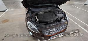 Brown Volvo XC60 2015 in Tallinn, with an engine capacity of 2.40 L and mileage of 174 thousand km for 17500 €, photo 13 on AUTOMOTO.COM.LV