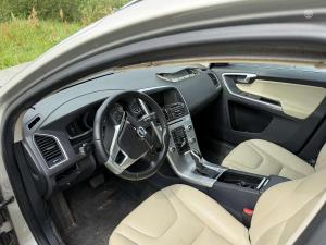 Brown Volvo XC60 2016 in Utena, with an engine capacity of 1.97 L and mileage of 130 thousand km for 6990 €, photo 13 on AUTOMOTO.COM.LV