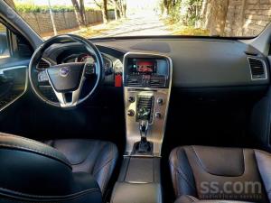 Brown Volvo XC60 2016 in Riga, with an engine capacity of 2.40 L and mileage of 193 thousand km for 15990 €, photo 14 on AUTOMOTO.COM.LV