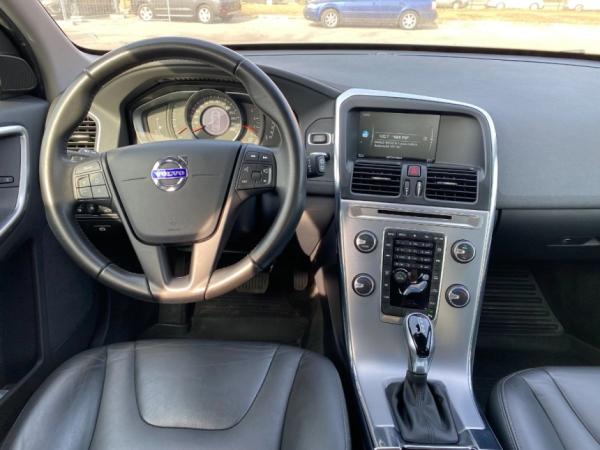 Brown Volvo XC60 2017 in Riga, with an engine capacity of 2.00 L and mileage of 253 thousand km for 15950 €, photo 7 on AUTOMOTO.COM.LV