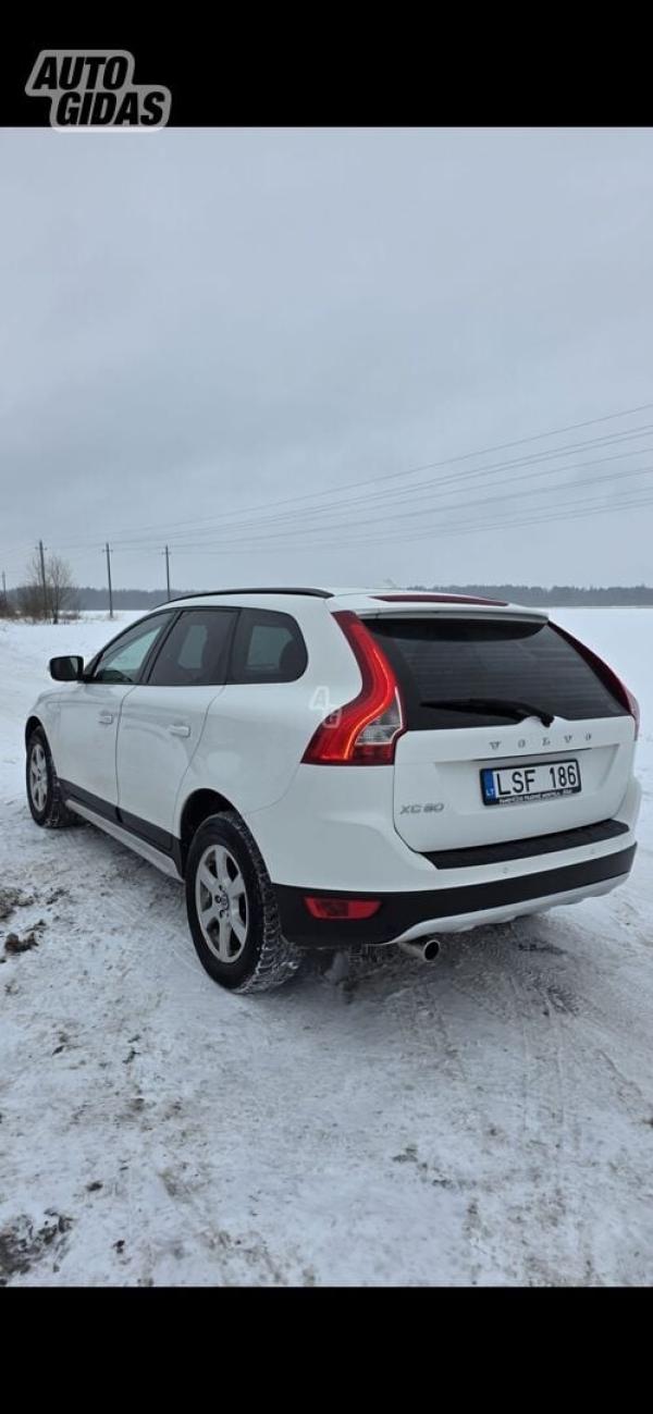 Volvo XC60 2012 in Panevezys, with an engine capacity of 2.00 L and mileage of 245 thousand km for 6450 €, photo 1 on AUTOMOTO.COM.LV
