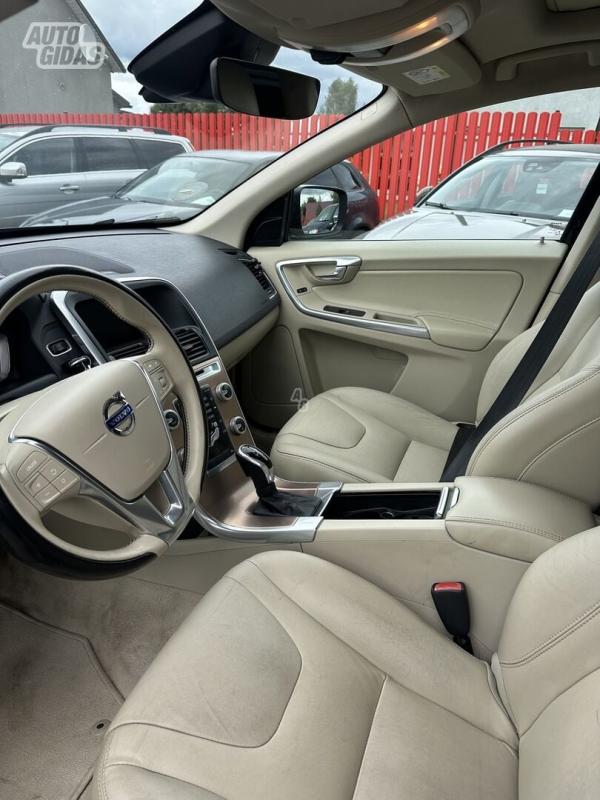 Volvo XC60 2014 in Pabrade, with an engine capacity of 2.00 L and mileage of 297 thousand km for 12250 €, photo 10 on AUTOMOTO.COM.LV