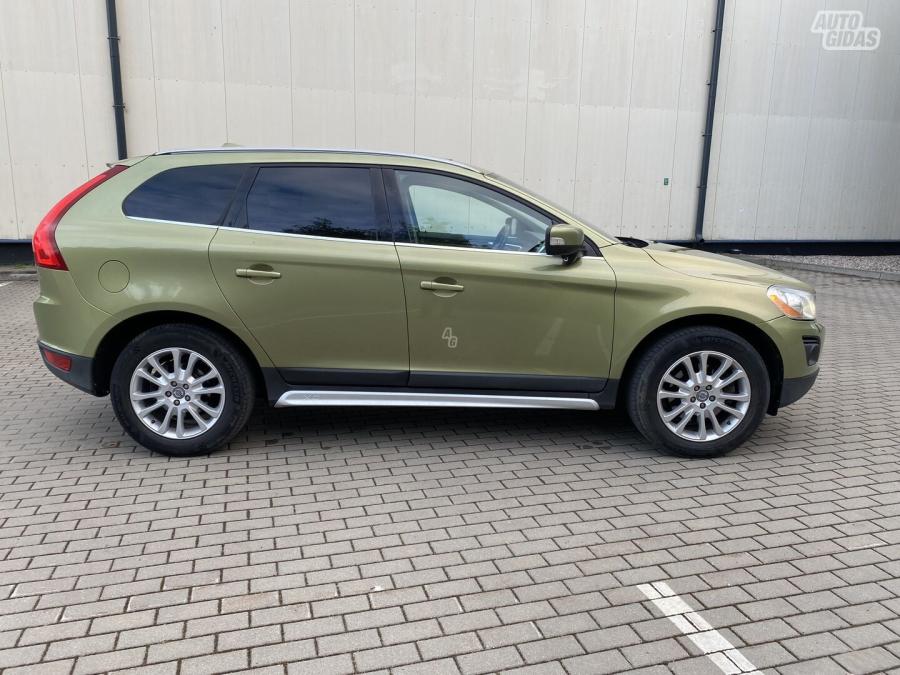 Green Volvo XC60 2009 in Vilnius, with an engine capacity of 2.40 L and mileage of 292 thousand km for 9300 €, photo 9 on AUTOMOTO.COM.LV
