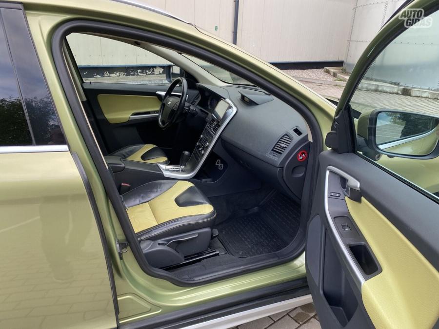 Green Volvo XC60 2009 in Vilnius, with an engine capacity of 2.40 L and mileage of 292 thousand km for 9300 €, photo 21 on AUTOMOTO.COM.LV