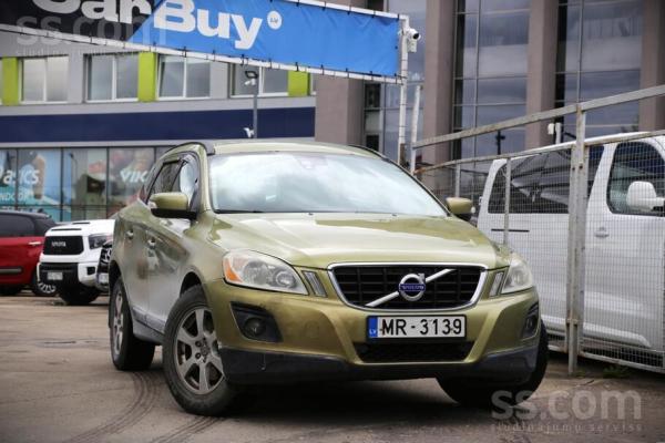 Green Volvo XC60 2009 in Riga, with an engine capacity of 2.40 L and mileage of 463 thousand km for 2995 €, photo 1 on AUTOMOTO.COM.LV