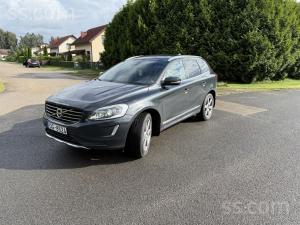 Green Volvo XC60 2013 in Riga, with an engine capacity of 2.00 L and mileage of 285 thousand km for 12350 €, photo  on AUTOMOTO.COM.LV