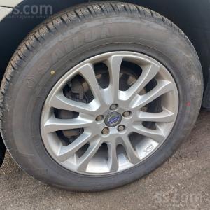 Grey Volvo XC60 2009 in Riga, with an engine capacity of 2.40 L and mileage of 399 thousand km for 6500 €, photo 11 on AUTOMOTO.COM.LV