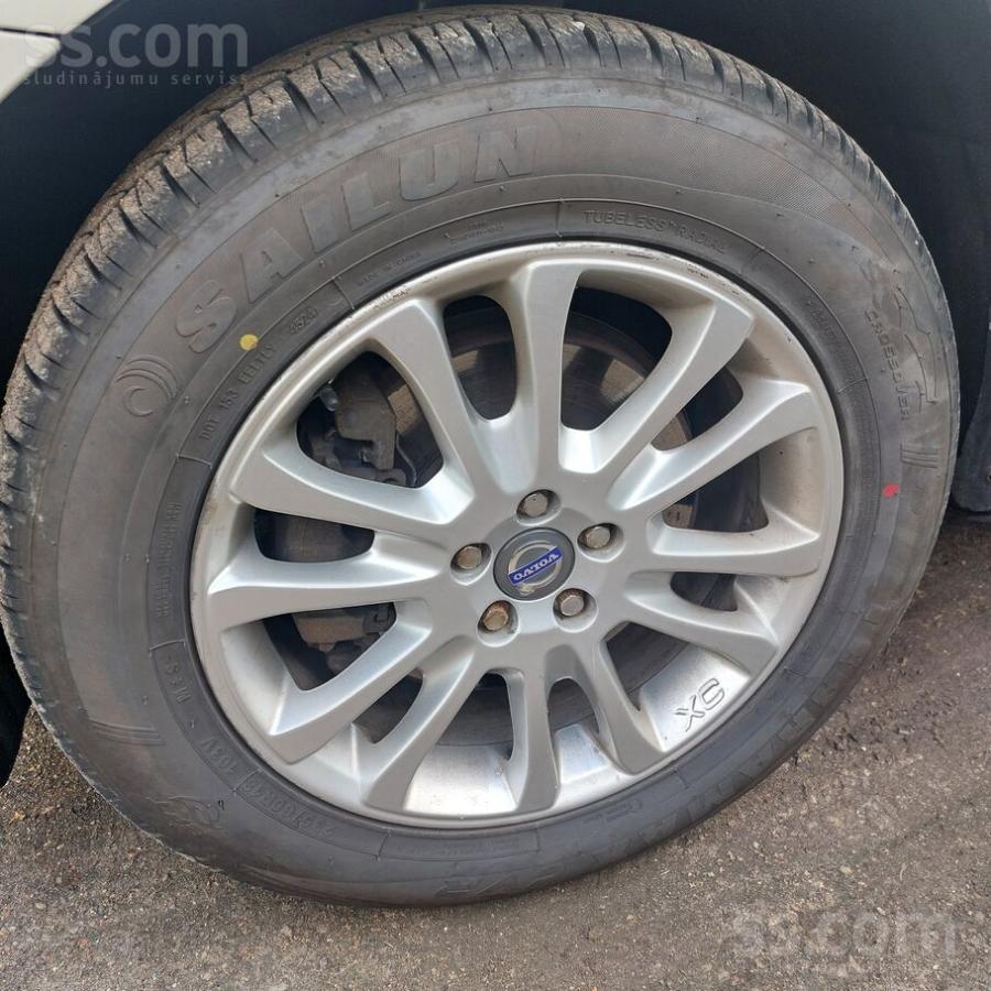Grey Volvo XC60 2009 in Riga, with an engine capacity of 2.40 L and mileage of 399 thousand km for 6500 €, photo 11 on AUTOMOTO.COM.LV