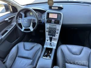 Grey Volvo XC60 2010 in Riga, with an engine capacity of 2.40 L and mileage of 346 thousand km for 7800 €, photo 26 on AUTOMOTO.COM.LV