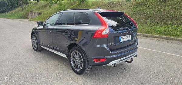 Grey Volvo XC60 2010 in Jonava, with an engine capacity of 2.40 L and mileage of 301 thousand km for 8999 €, photo 9 on AUTOMOTO.COM.LV