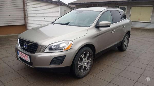 Grey Volvo XC60 2011 in Vilnius, with an engine capacity of 2.40 L and mileage of 300 thousand km for 7400 €, photo 1 on AUTOMOTO.COM.LV