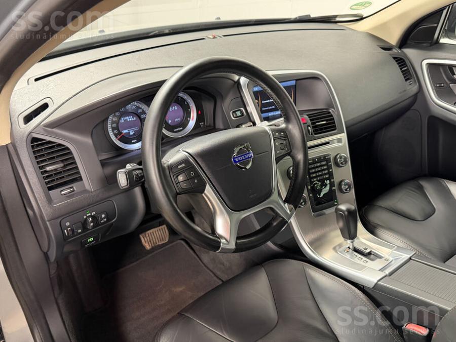Grey Volvo XC60 2011 in Jurmala, with an engine capacity of 2.00 L and mileage of 212 thousand km for 10450 €, photo 17 on AUTOMOTO.COM.LV