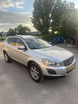 Pelēks Volvo XC60 2011 Šakiai, ar dzinēja tilpumu 2.40 L un nobraukumu 400 tūkst. km par 6250 €, foto  vietnē AUTOMOTO.COM.LV