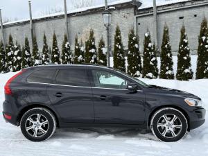 Grey Volvo XC60 2012 in Siauliai, with an engine capacity of 2.40 L and mileage of 290 thousand km for 11950 €, photo 6 on AUTOMOTO.COM.LV