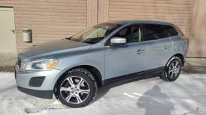 Grey Volvo XC60 2012 in Riga, with an engine capacity of 2.40 L and mileage of 273 thousand km for 9490 €, photo 12 on AUTOMOTO.COM.LV