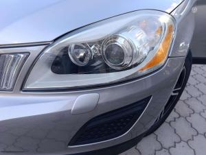 Grey Volvo XC60 2012 in Panevezys, with an engine capacity of 2.40 L and mileage of 204 thousand km for 8400 €, photo 15 on AUTOMOTO.COM.LV