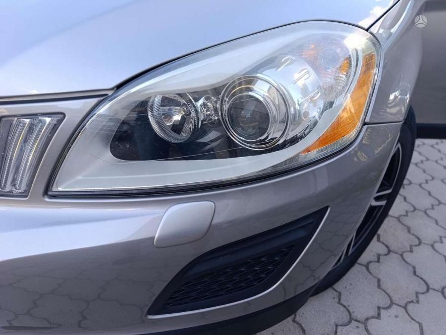 Grey Volvo XC60 2012 in Panevezys, with an engine capacity of 2.40 L and mileage of 204 thousand km for 8400 €, photo 15 on AUTOMOTO.COM.LV