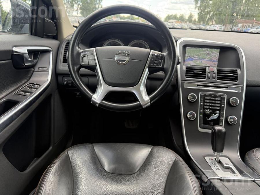 Grey Volvo XC60 2012 in Riga, with an engine capacity of 2.40 L and mileage of 292 thousand km for 9280 €, photo 12 on AUTOMOTO.COM.LV