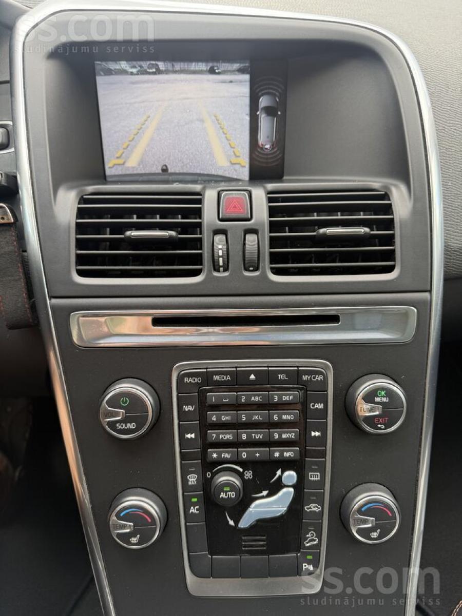 Grey Volvo XC60 2012 in Riga, with an engine capacity of 2.40 L and mileage of 292 thousand km for 9280 €, photo 13 on AUTOMOTO.COM.LV