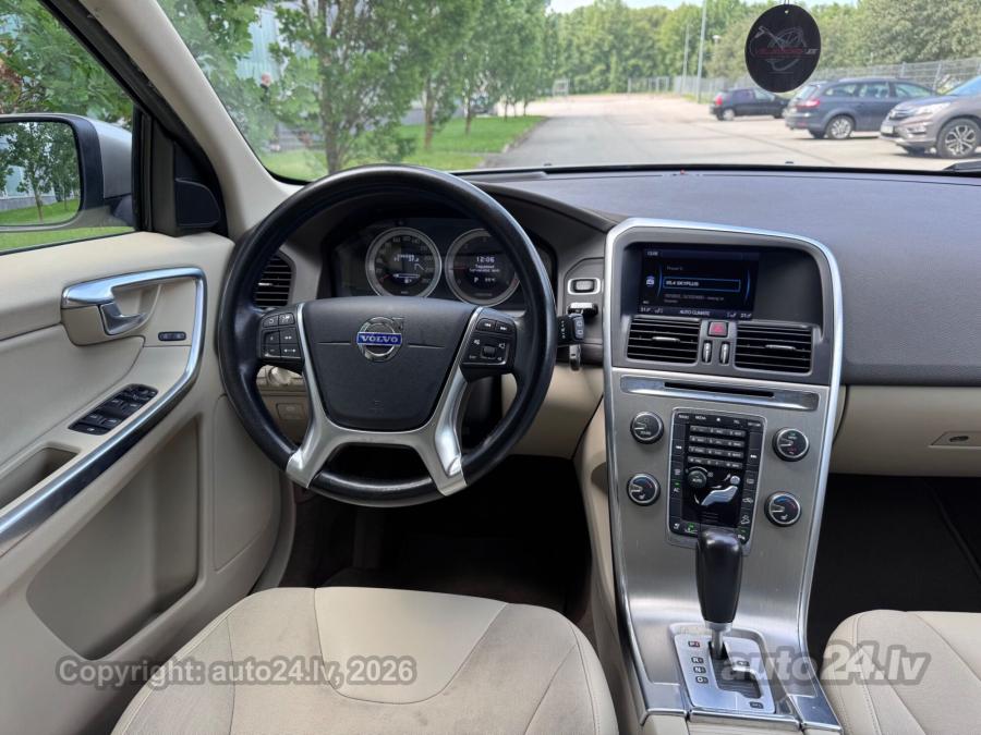 Grey Volvo XC60 2012 in Tallinn, with an engine capacity of 2.40 L and mileage of 0 thousand km for 7950 €, photo 11 on AUTOMOTO.COM.LV