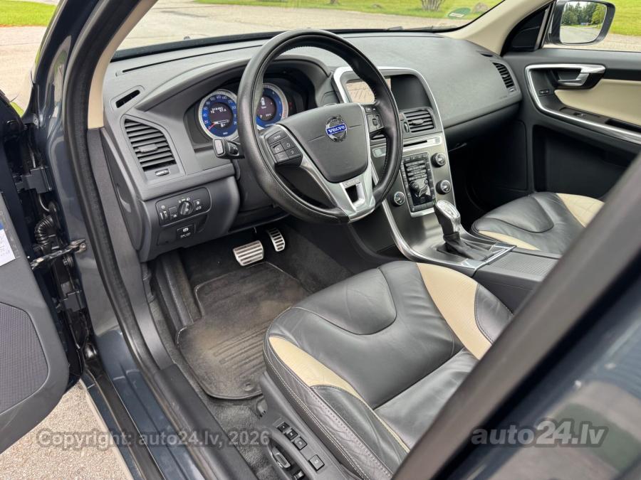 Grey Volvo XC60 2012 in Rapla, with an engine capacity of 2.40 L and mileage of 310 thousand km for 10900 €, photo 11 on AUTOMOTO.COM.LV