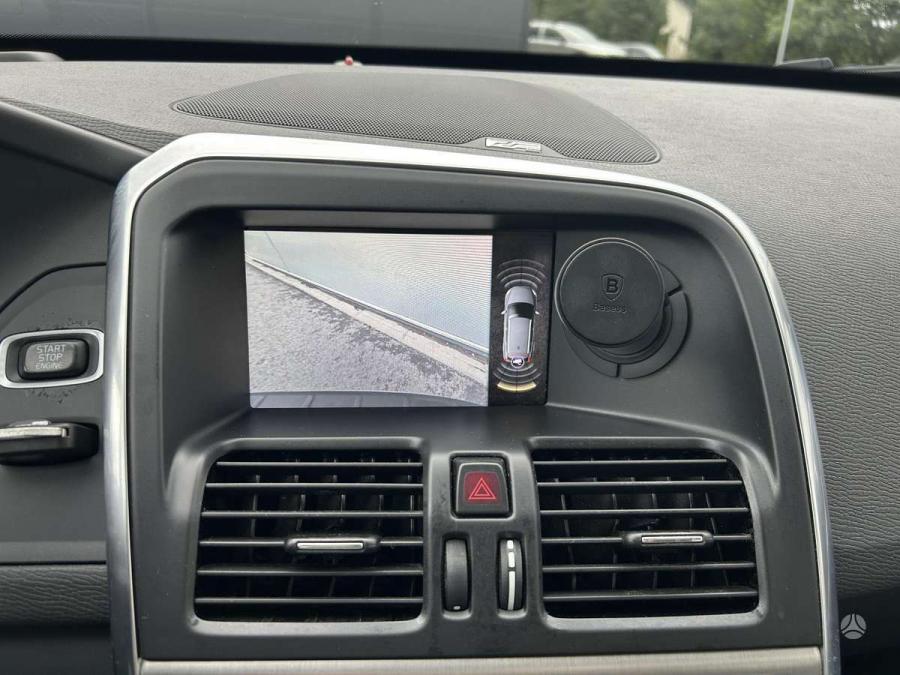 Grey Volvo XC60 2012 in Utena, with an engine capacity of 2.40 L and mileage of 302 thousand km for 9190 €, photo 15 on AUTOMOTO.COM.LV