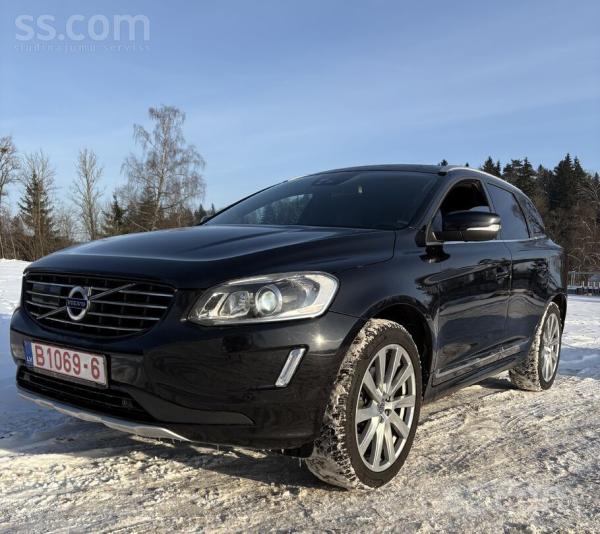 Grey Volvo XC60 2013 in Ogre, with an engine capacity of 2.40 L and mileage of 216 thousand km for 14000 €, photo 3 on AUTOMOTO.COM.LV