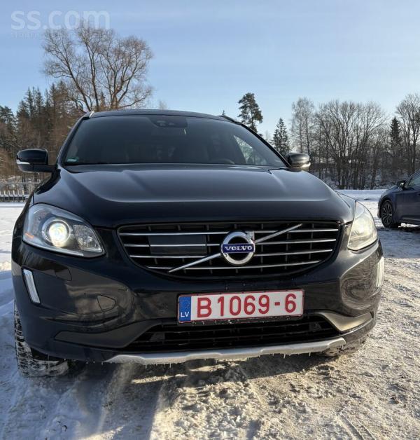 Grey Volvo XC60 2013 in Ogre, with an engine capacity of 2.40 L and mileage of 216 thousand km for 14000 €, photo 4 on AUTOMOTO.COM.LV
