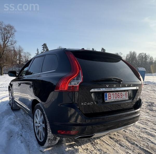 Grey Volvo XC60 2013 in Ogre, with an engine capacity of 2.40 L and mileage of 216 thousand km for 14000 €, photo 6 on AUTOMOTO.COM.LV