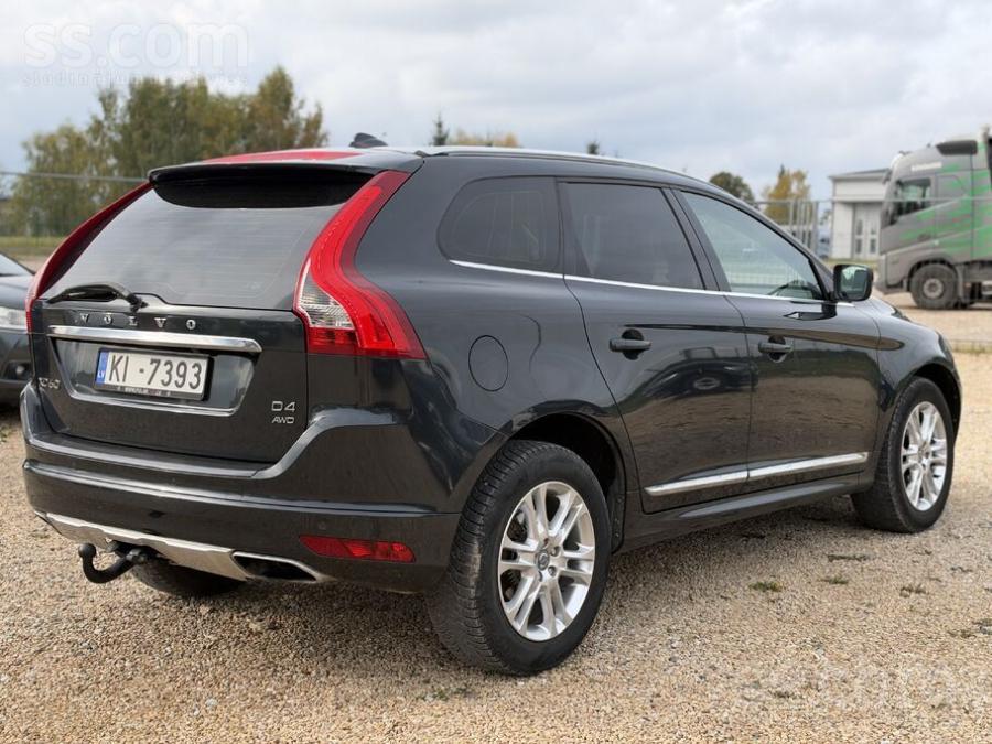 Grey Volvo XC60 2013 in Valmiera, with an engine capacity of 2.40 L and mileage of 274 thousand km for 9499 €, photo 6 on AUTOMOTO.COM.LV