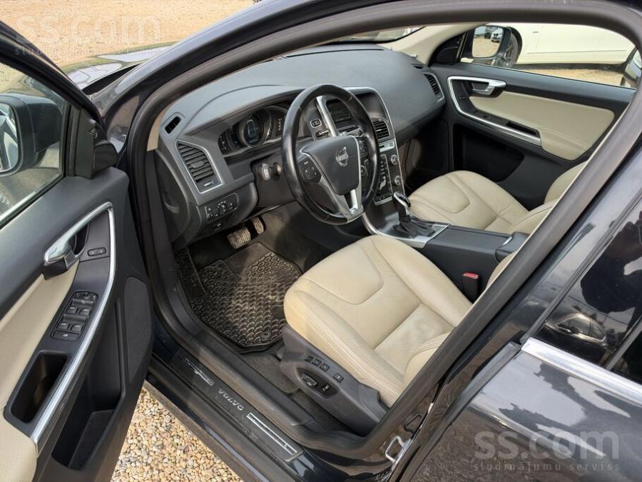 Grey Volvo XC60 2013 in Valmiera, with an engine capacity of 2.40 L and mileage of 274 thousand km for 9499 €, photo 9 on AUTOMOTO.COM.LV