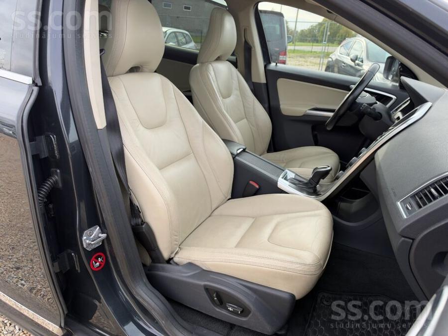 Grey Volvo XC60 2013 in Valmiera, with an engine capacity of 2.40 L and mileage of 274 thousand km for 9499 €, photo 12 on AUTOMOTO.COM.LV