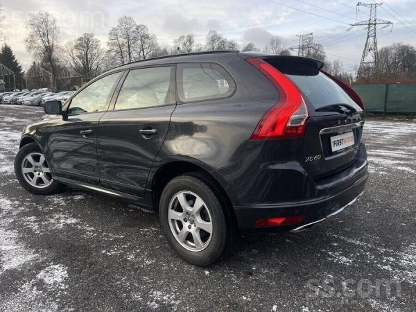 Grey Volvo XC60 2014 in Riga, with an engine capacity of 2.00 L and mileage of 252 thousand km for 10950 €, photo 2 on AUTOMOTO.COM.LV