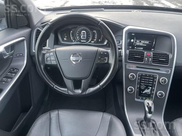 Grey Volvo XC60 2014 in Riga, with an engine capacity of 2.00 L and mileage of 252 thousand km for 10950 €, photo 7 on AUTOMOTO.COM.LV