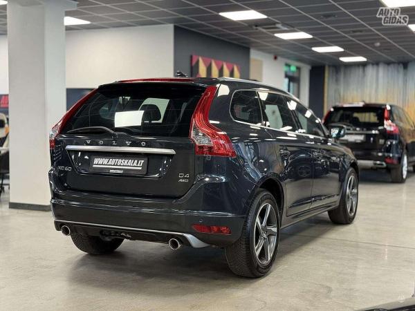 Grey Volvo XC60 2014 in Klaipeda, with an engine capacity of 2.40 L and mileage of 294 thousand km for 14450 €, photo 4 on AUTOMOTO.COM.LV